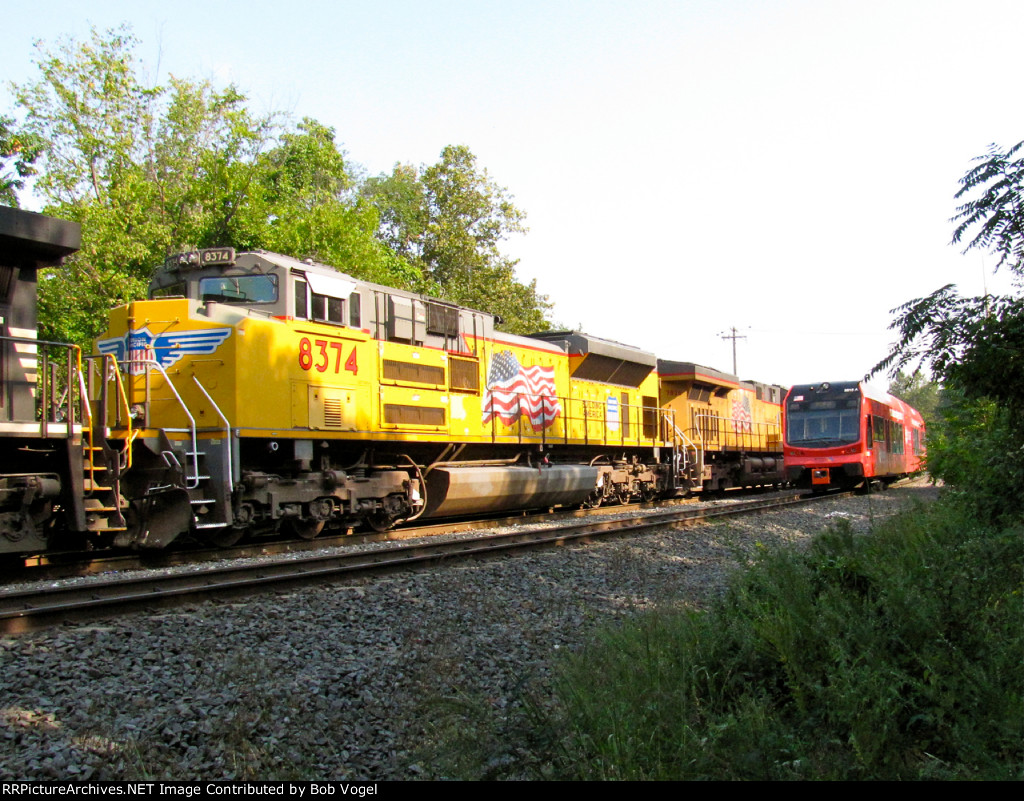UP 8374 and 7876; NJT 3515